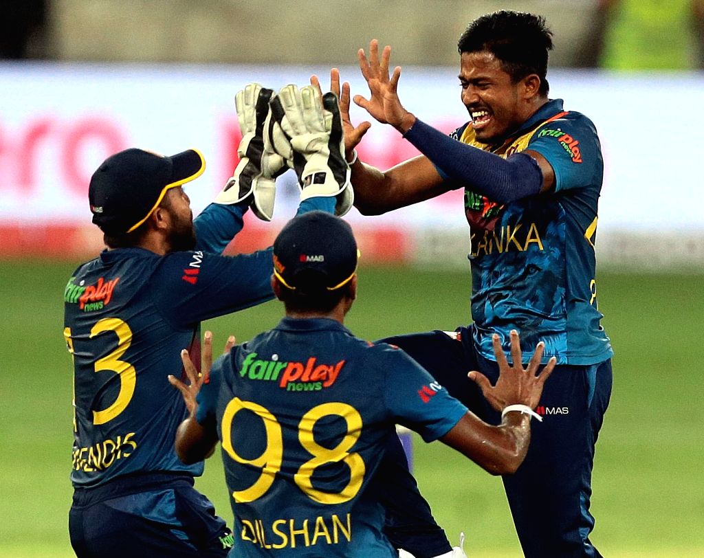 :Dubai: Sri Lanka's Pramod Madushan celebrates Pakistan's Fakhar Zaman ...