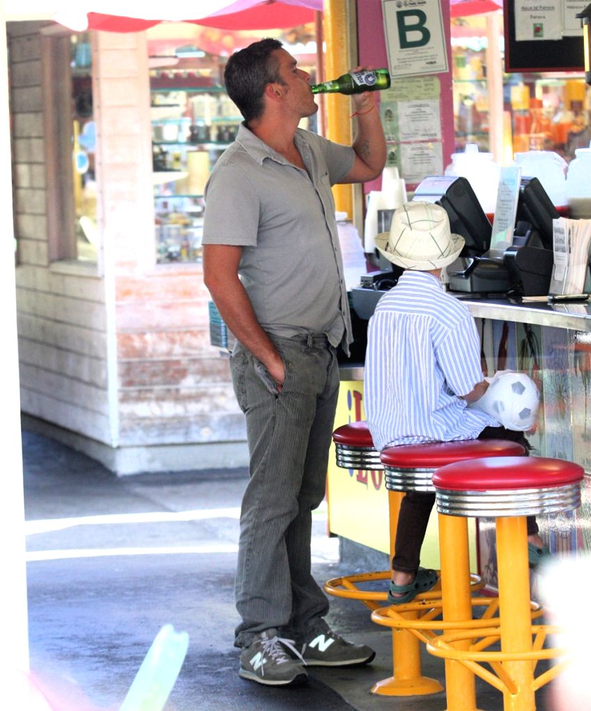 **Exclusive**Balthazar Getty enjoys a bottle of Rolling Rock beer while ...