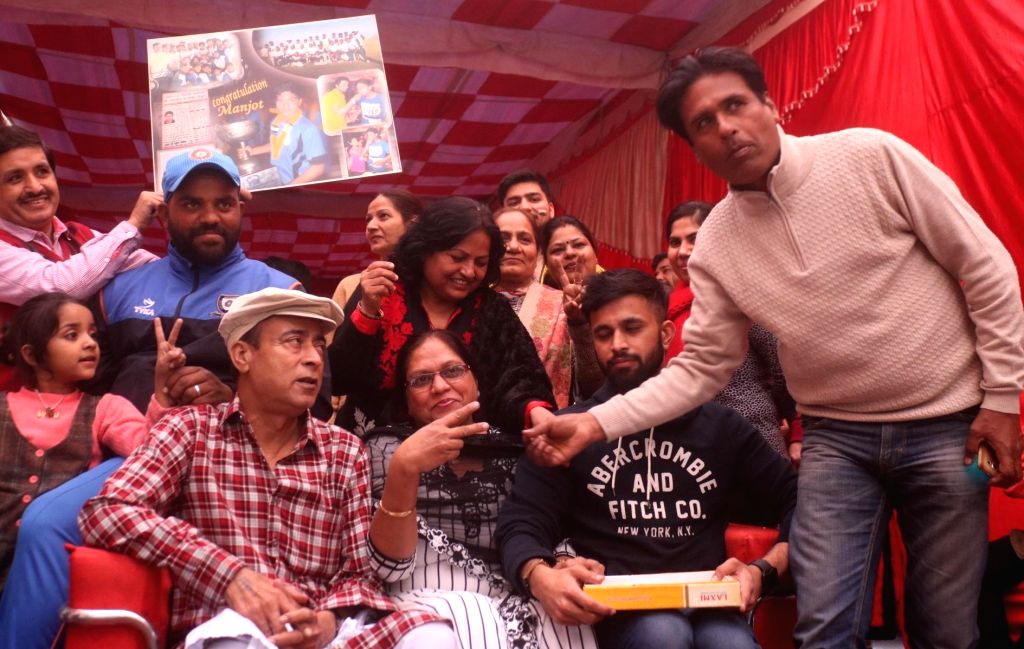 Cricketer Manjot Kalra's family celebrates after India wins U19 World Cup