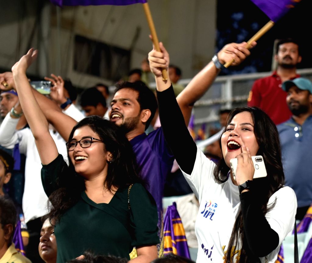 Fans cheer during the IPL 2023 match between KKR and LSG