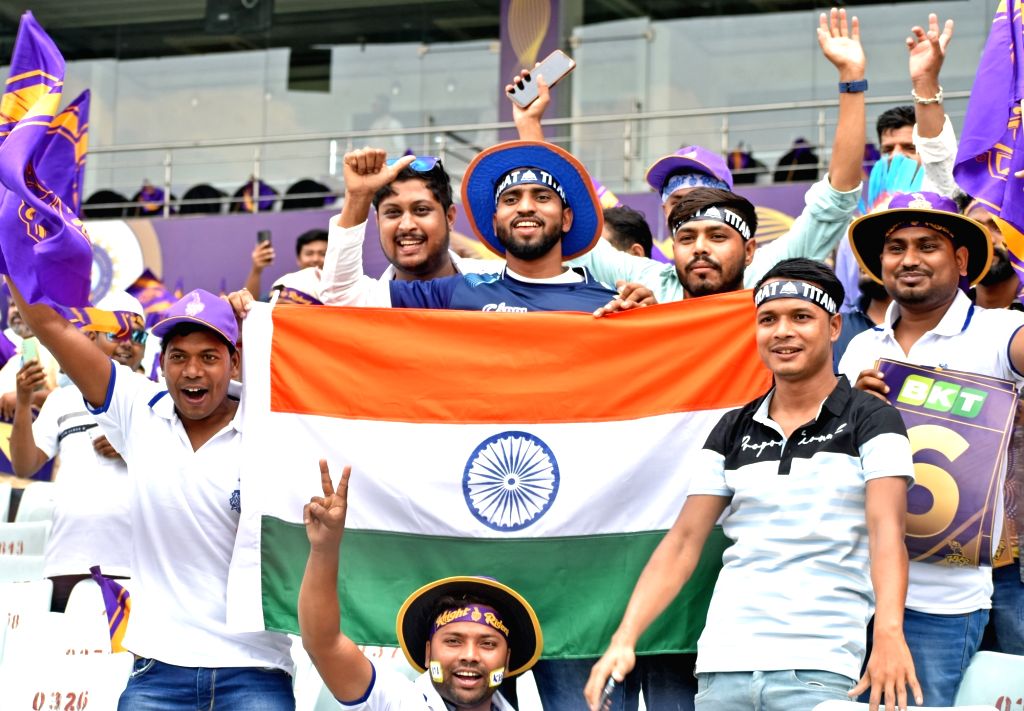 Kolkata : Fans cheer during the IPL match between Kolkata Knight Riders ...