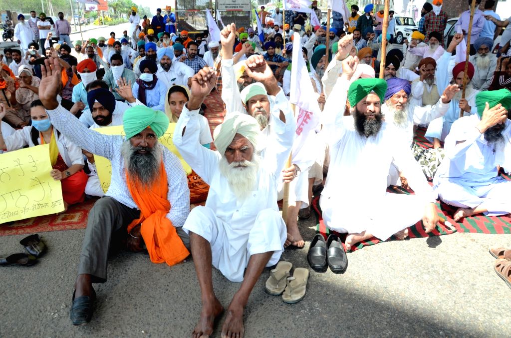 Farmers protest during a nation-wide strike call given by various ...