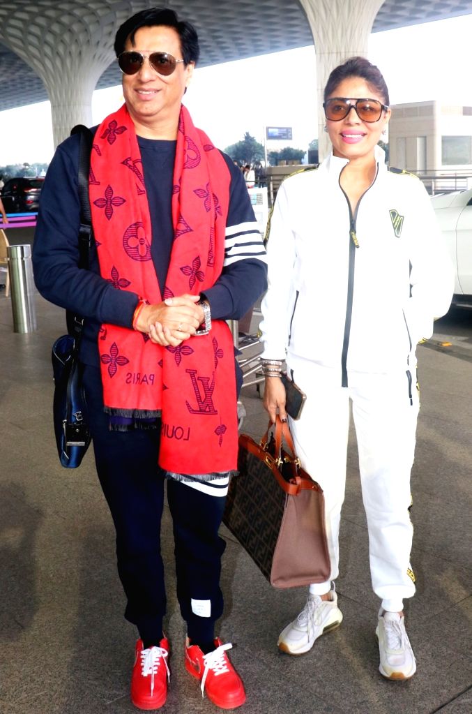 : Mumbai : Film Director Madhur Bhandarkar with Wife Renu Namboodiri ...
