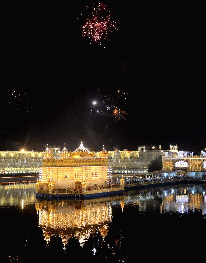 Fireworks at illuminated Golden Temple on Guru Nanak Jayanti
