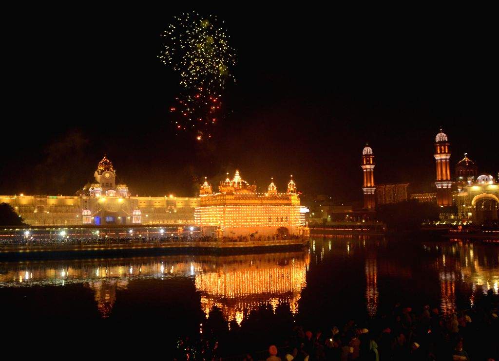 Fireworks at illuminated Golden Temple on Guru Nanak Jayanti