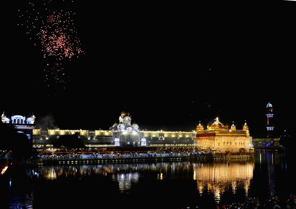Fireworks at the Golden Temple to mark the birth anniversary of the ...