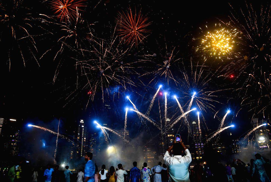 Fireworks dazzle the sky as people celebrate Diwali in Mumbai