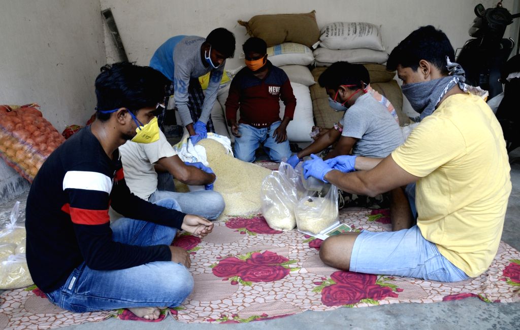 Food packets being prepared to be distributed among poor during lockdown
