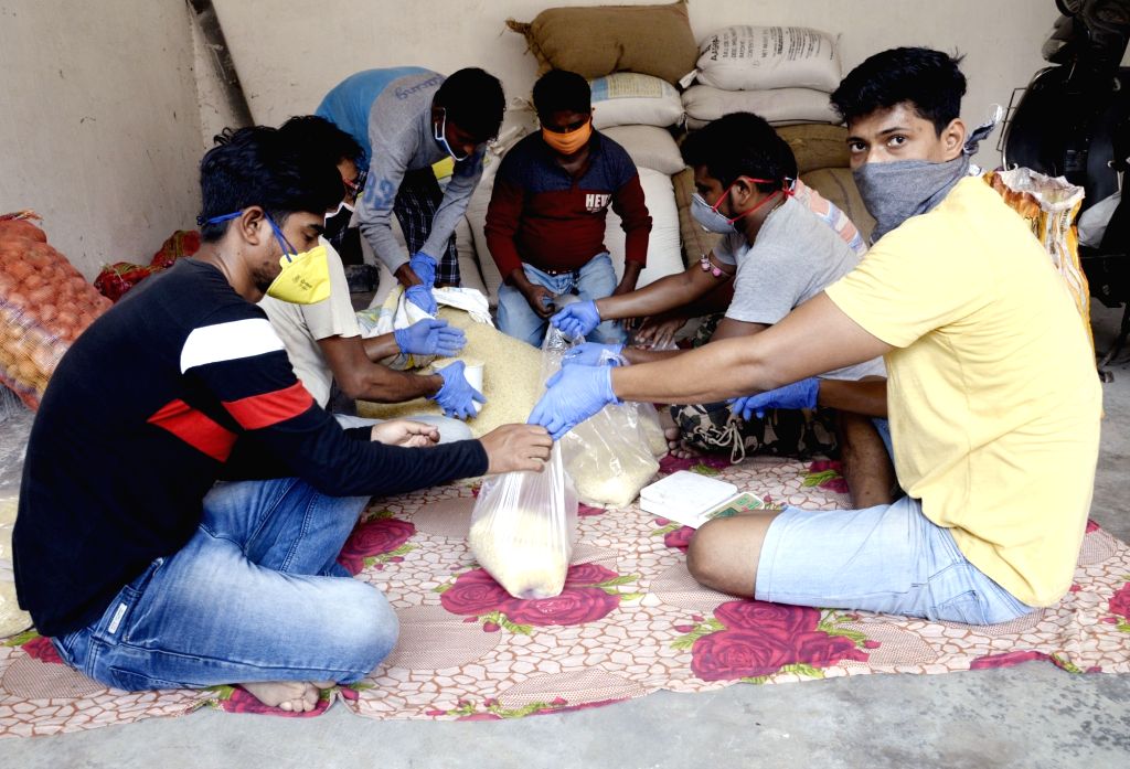 Food packets being prepared to be distributed among poor during lockdown