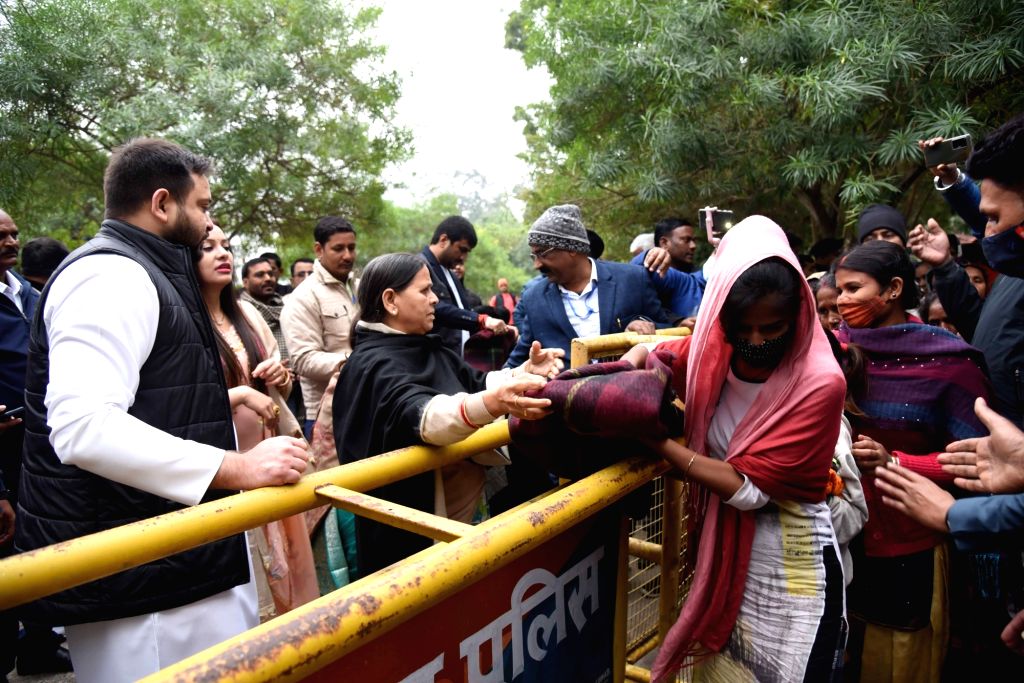Former Bihar Chief Minister Rabri Devi with RJD leader Tejaswi Yadav ...