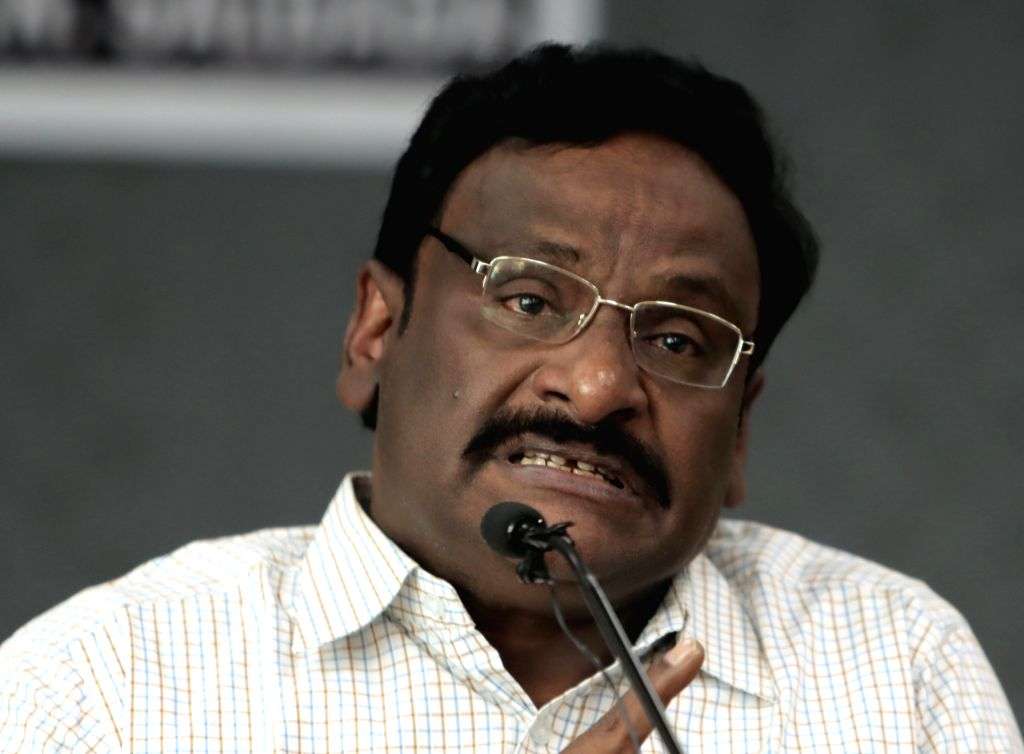 Former Delhi University professor G.N. Saibaba addresses a press ...