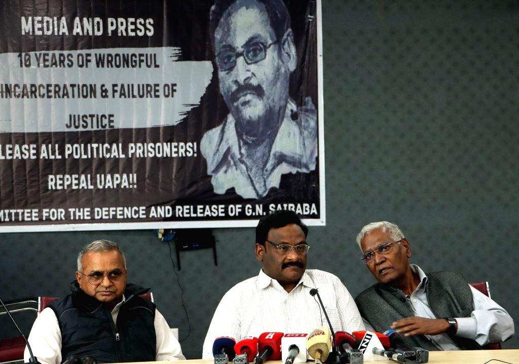 Former Delhi University professor G.N. Saibaba addresses a press ...