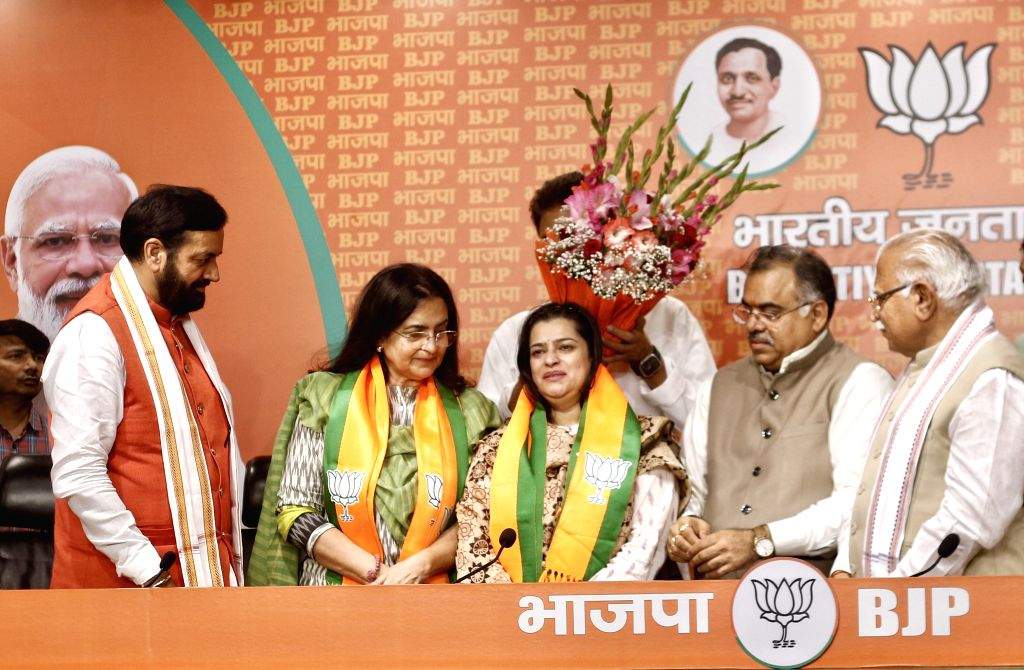 Former Haryana Congress leader Kiran Choudhry along with her daughter ...