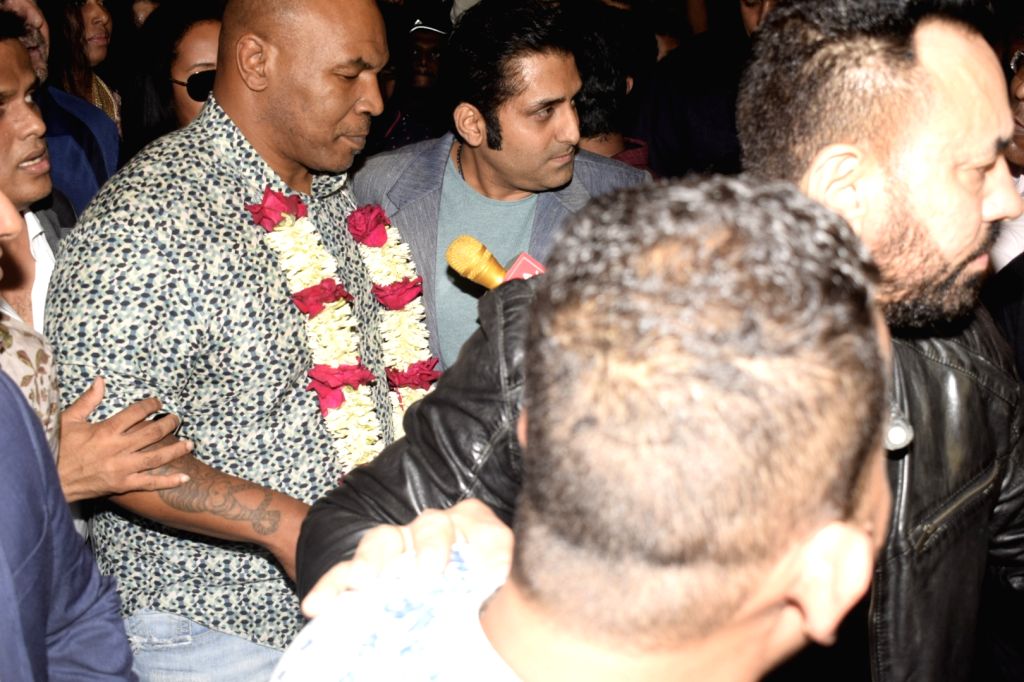 Mike Tyson arrives