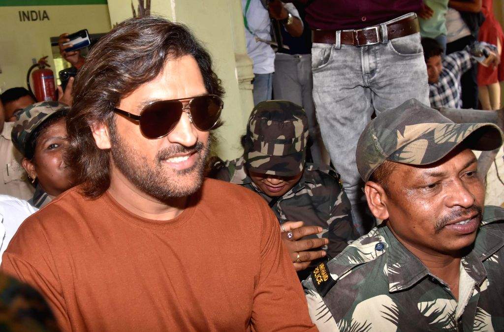 Former Indian cricketer MS Dhoni casts his vote in the sixth phase of ...