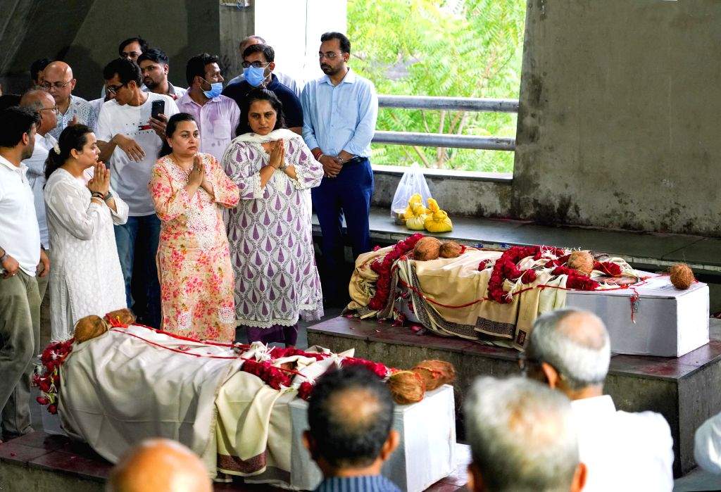 Funeral procession of plane crash victims from the same family