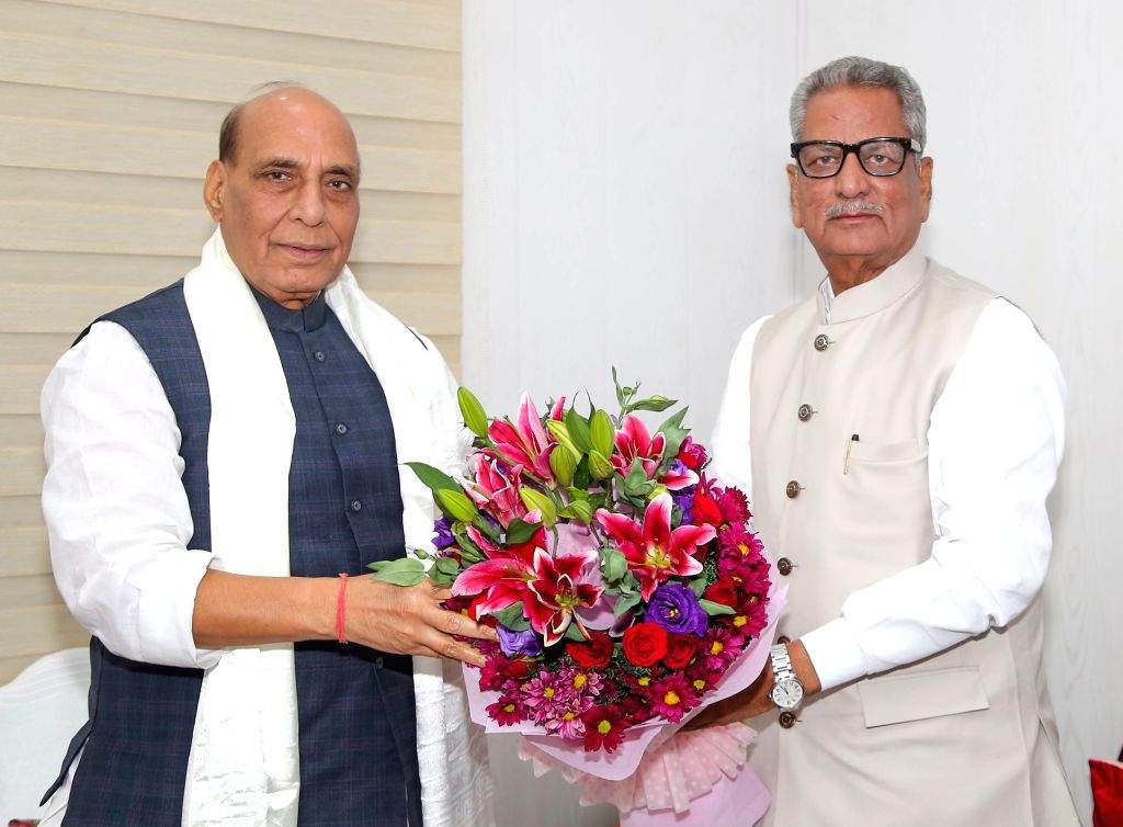 Governor of Sikkim Shri Omji Mathur meets with Defence Minister Rajnath ...