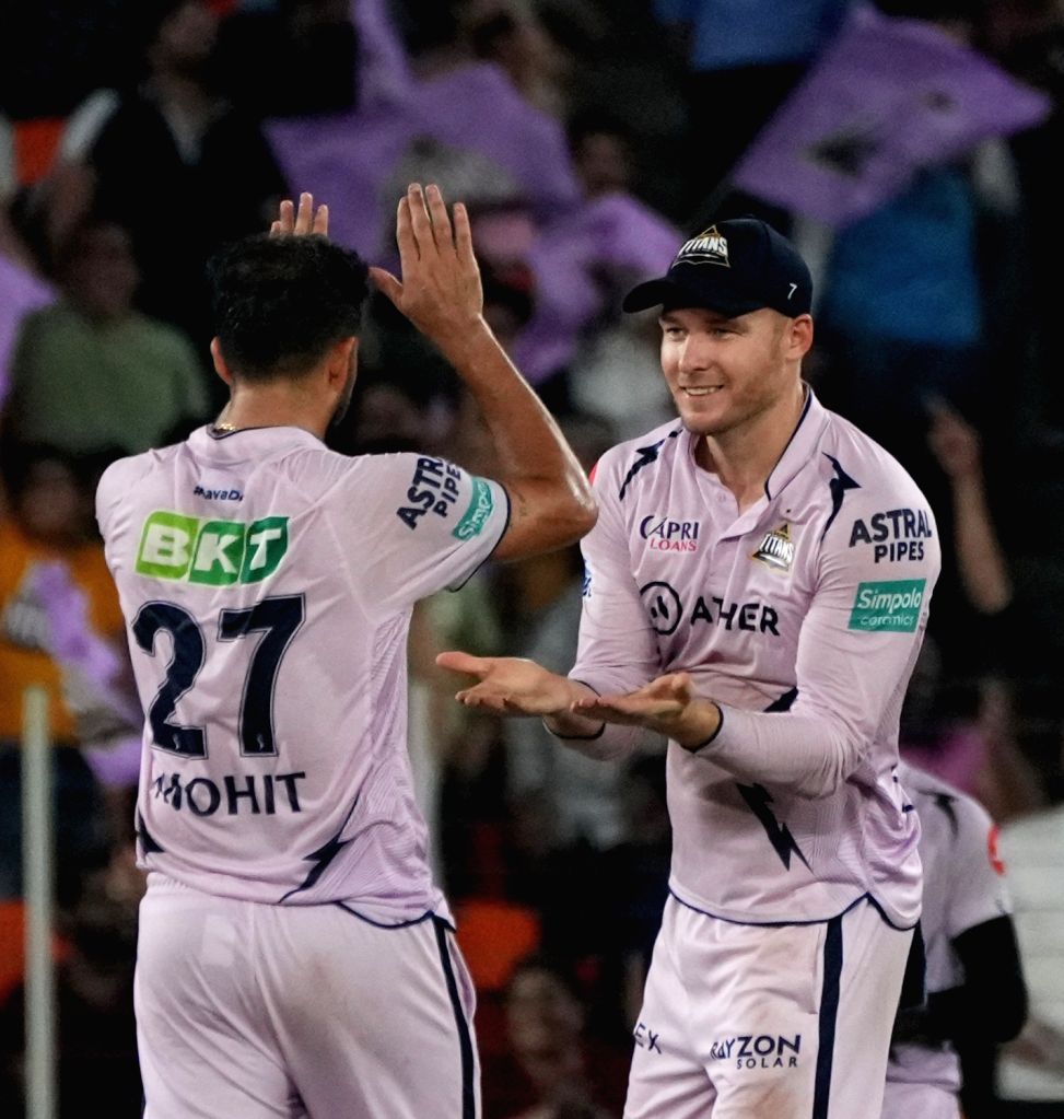 GT's bowler Mohit Sharma with teammate David Miller celebrate the ...