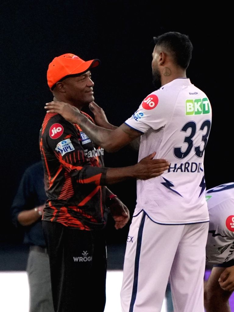 GT's captain Hardik Pandya with SRH's head coach Brian Lara before the ...