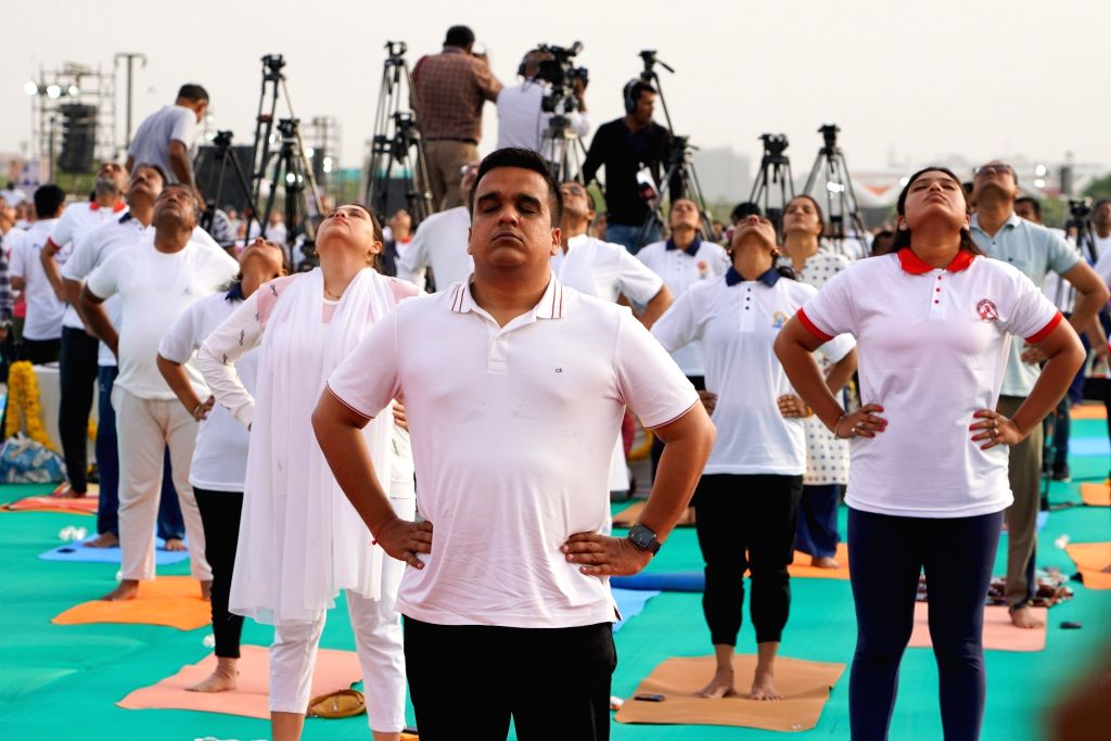 : Ahmedabad: Gujarat Home Minister Harsh Sanghvi performs yoga