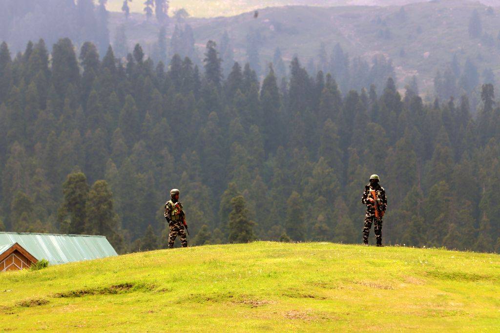 Security personnel stand guard upon CM's arrival