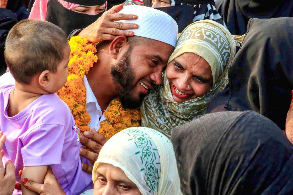Hajj Pilgrims arrive after completing their pilgrimage