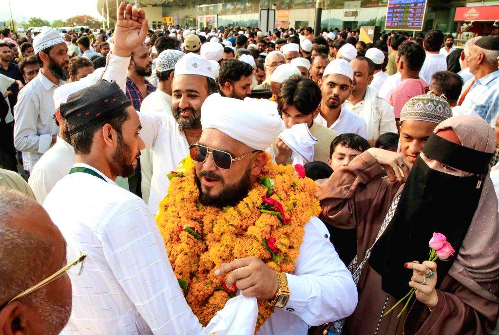 Hajj Pilgrims arrive after completing their pilgrimage