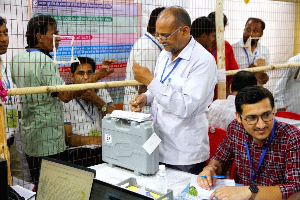 Haridwar : Polling officials at counting centre during the counting of ...