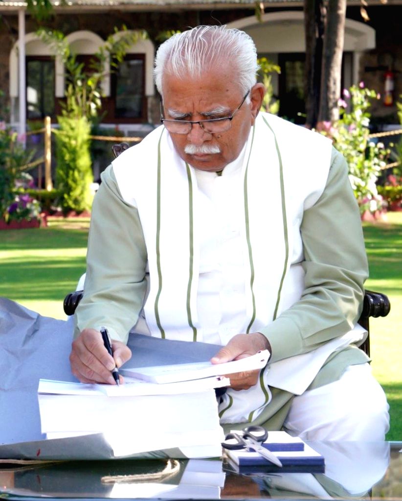 Haryana CM Manohar Lal signs copies of the State Budget 2023-24