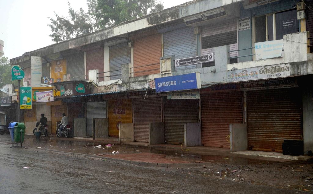 : Ahmedabad : Heavy rain lashes as shops remain closed as part of ...
