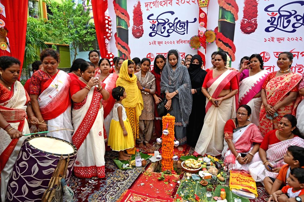 Hindu and Muslim community women together perform 'Khuti puja