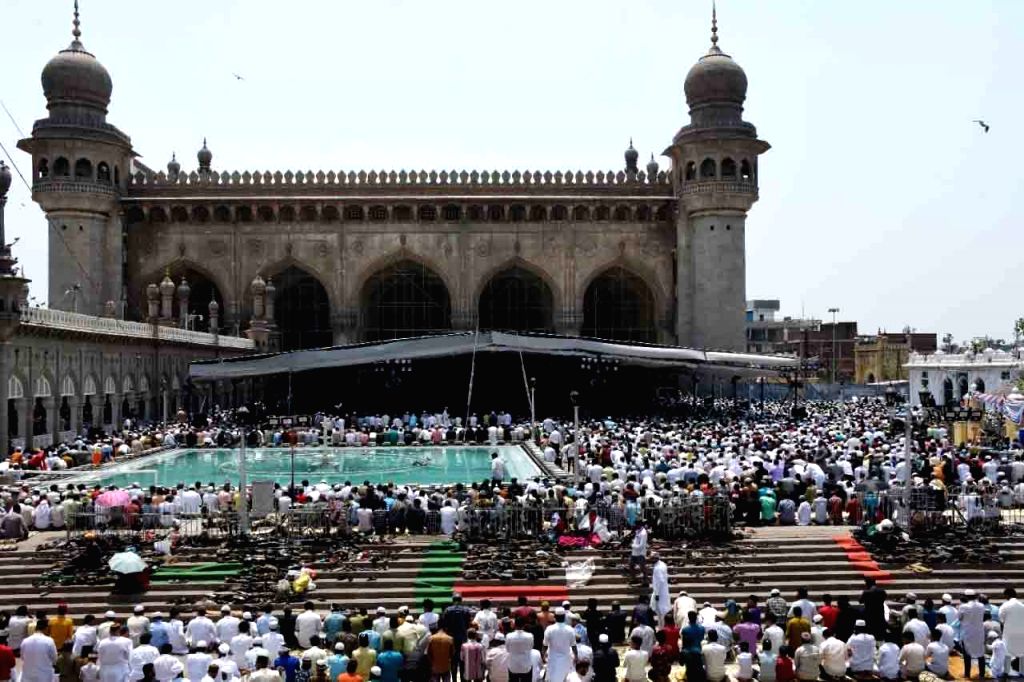Muslim devotees offer prayer on the last Friday of the holy month of ...