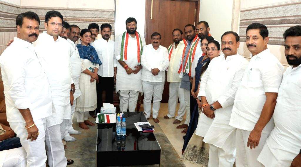 Telangana Chief Minister Revanth Reddy and AICC Telangana in-charge ...