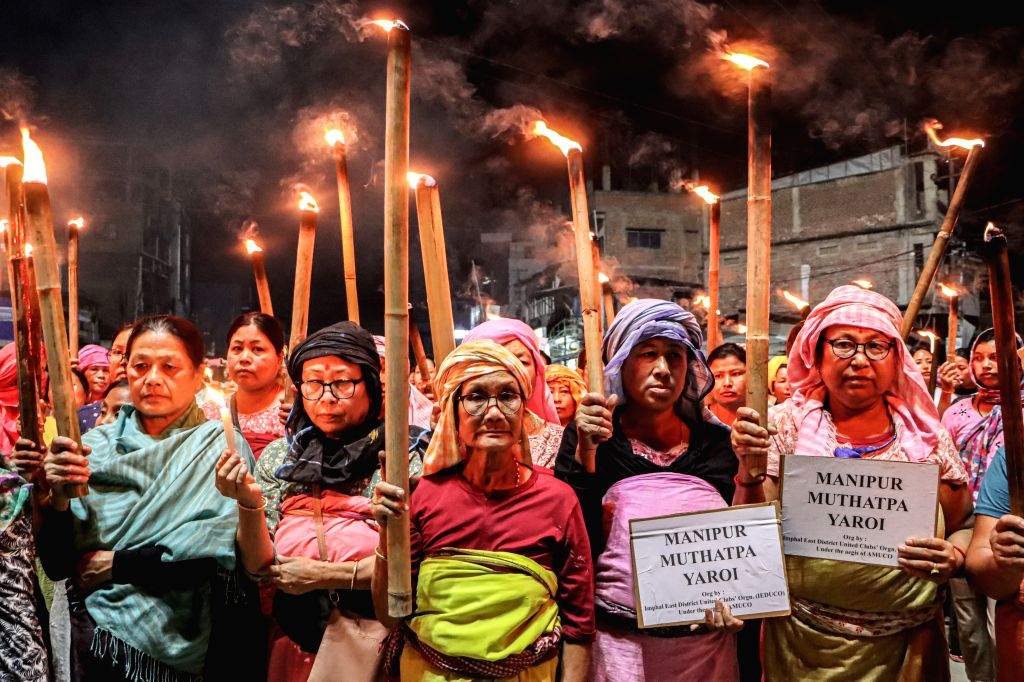 Imphal East: Meira Paibis of Khurai take out a meira (torch) rally