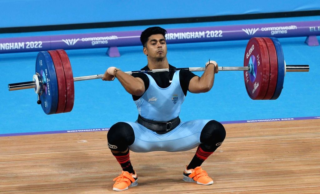 India's Achinta Sheuli competes in the Men's weightlifting 79kg Final ...