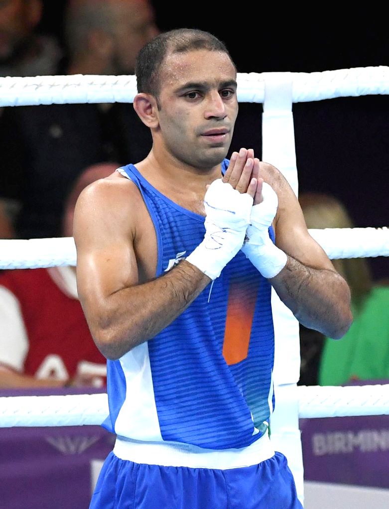 India's Amit Panghal reacts after winning in the semi-final match of ...