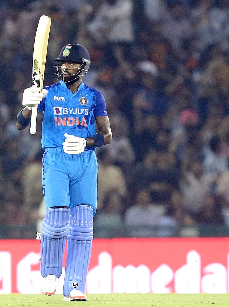 :Mohali:India's Hardik Pandya, right, celebrates scoring fifty runs.