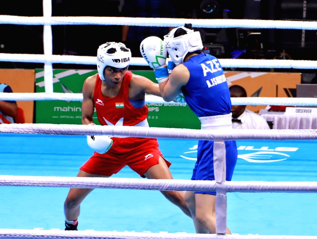 India's Nikhat Zareen (red) in an action with Azerbaijan's Anakhanim ...