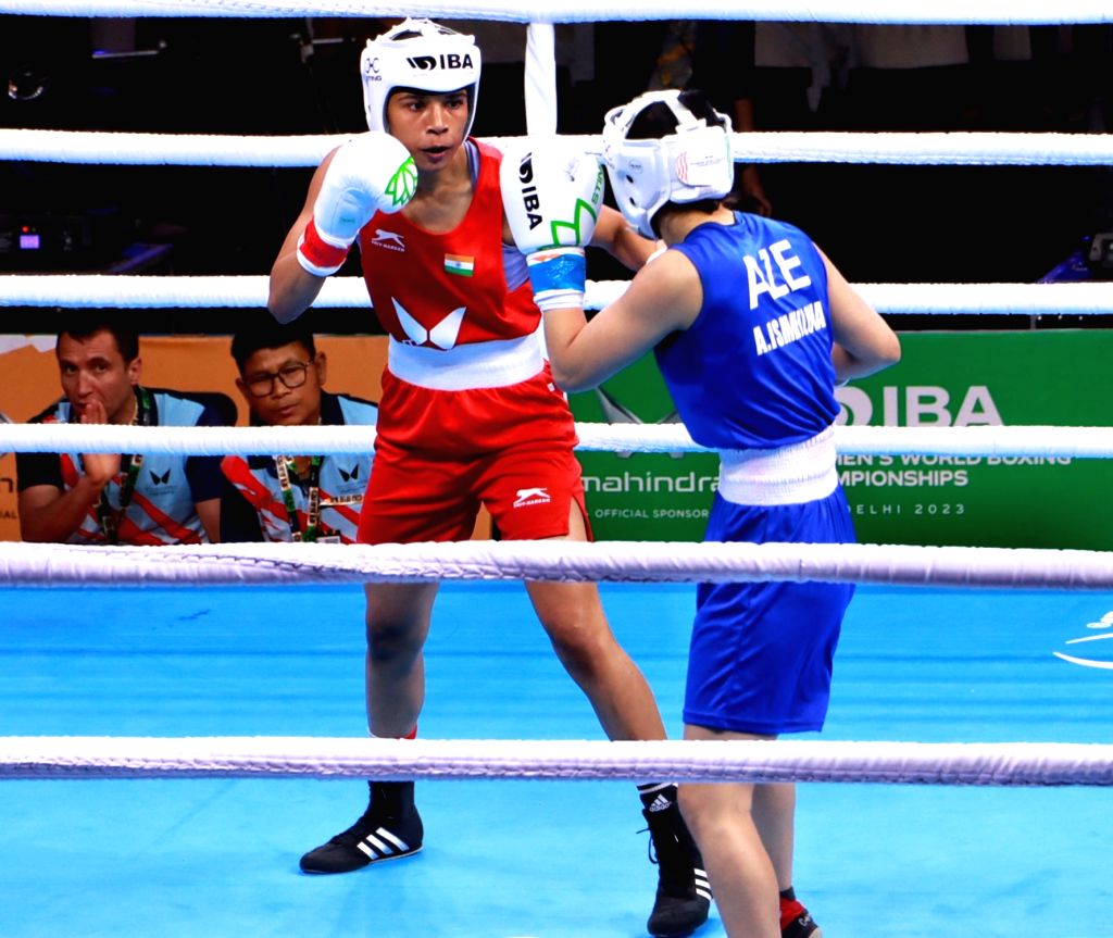 India's Nikhat Zareen (red) in an action with Azerbaijan's Anakhanim ...