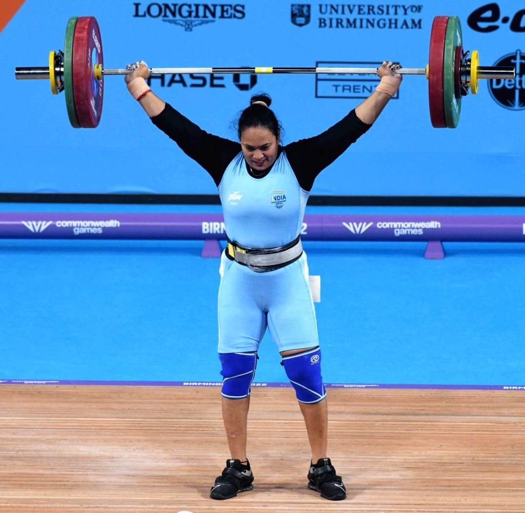 India's Punam Yadav attempts a lift during the women's 76kg ...