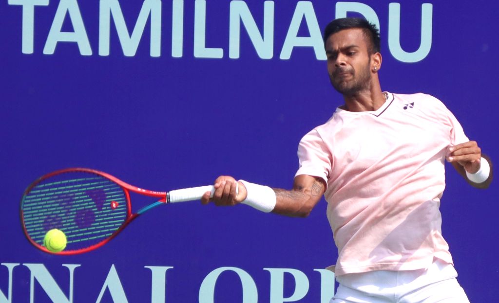 Sumit Nagal return a shot against South Korea tennis player Nam Ji-sung.