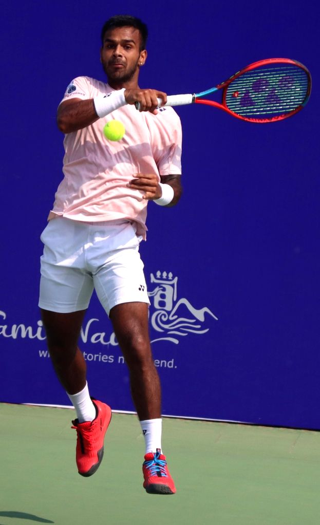 Sumit Nagal return a shot against South Korea tennis player Nam Ji-sung.
