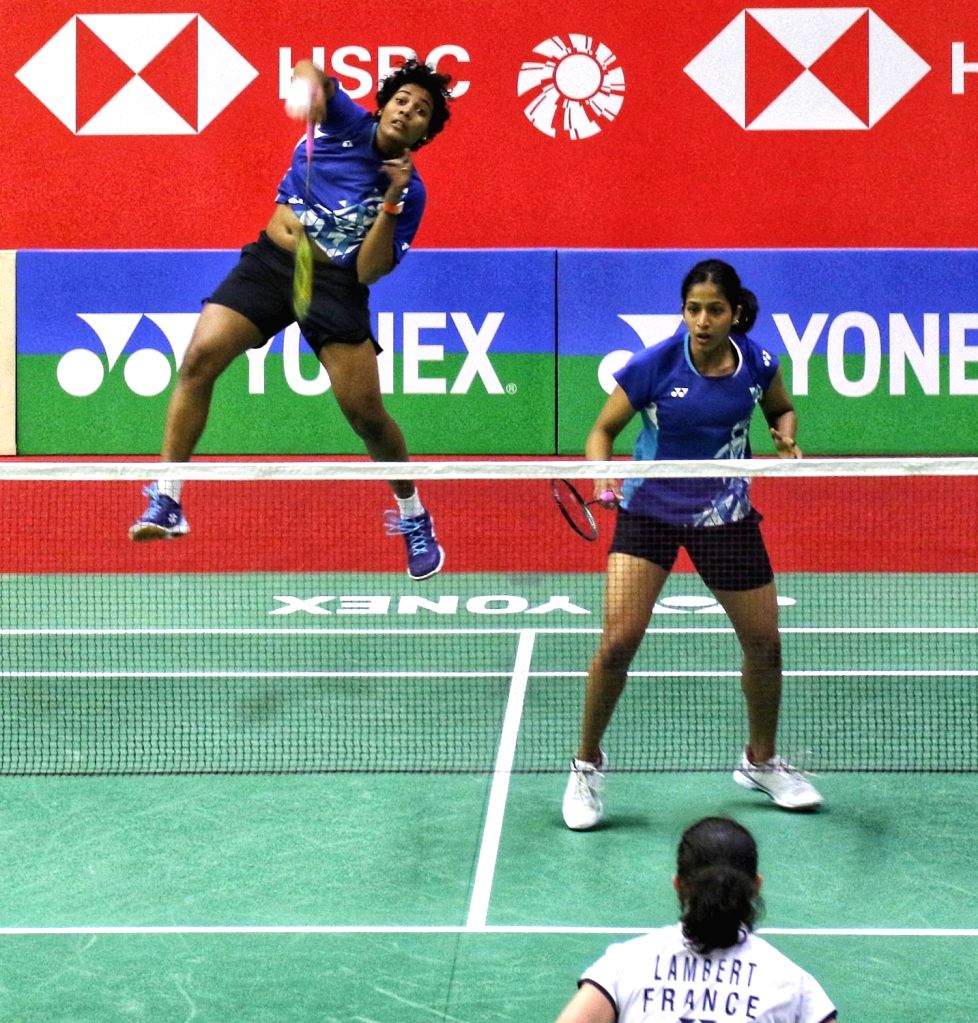 :New Delhi:Treesa Jolly and Gayatri Gopichand Pullela play a shot ...