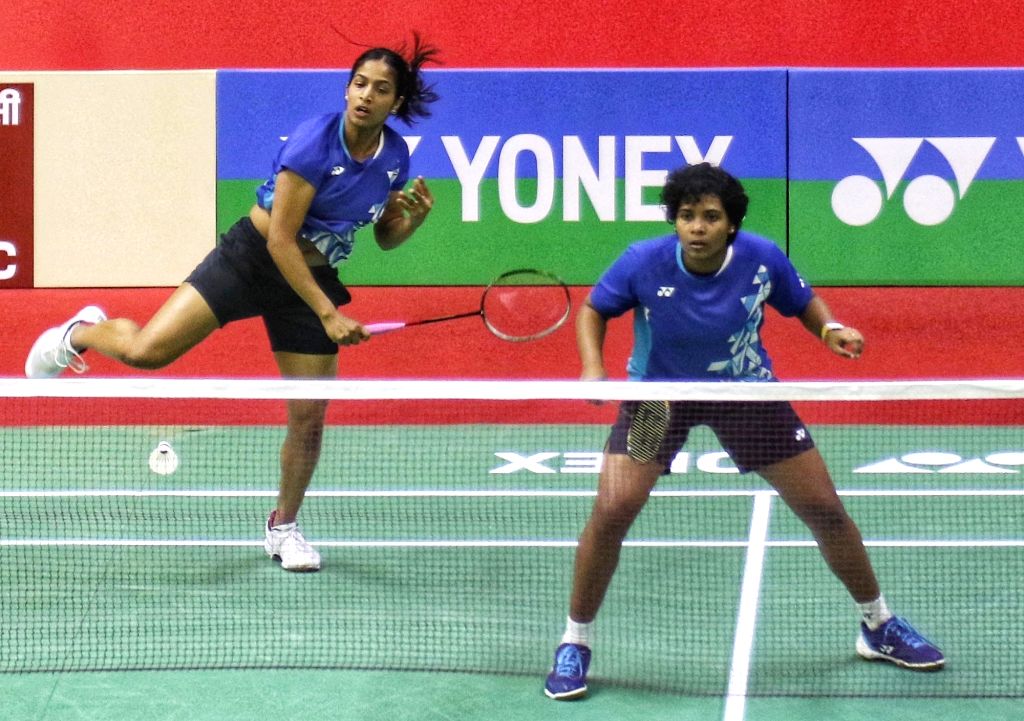 :New Delhi:Treesa Jolly and Gayatri Gopichand Pullela play a shot ...