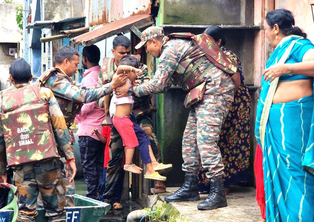 Indian Army personnel conduct relief operations in Suryawanshi Colony