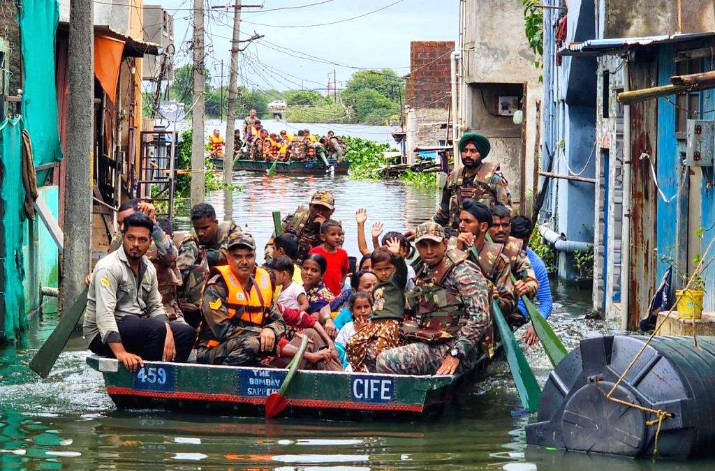 Indian Army personnel conduct relief operations in Suryawanshi Colony