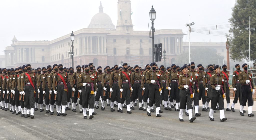 Indian Army soldiers lead by women soldiers march