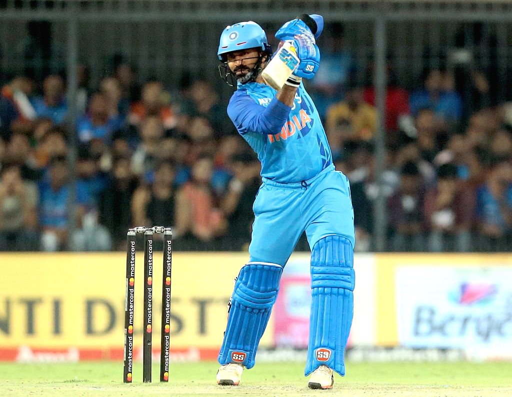 Indore : Indian batter Dinesh Karthik plays a shot