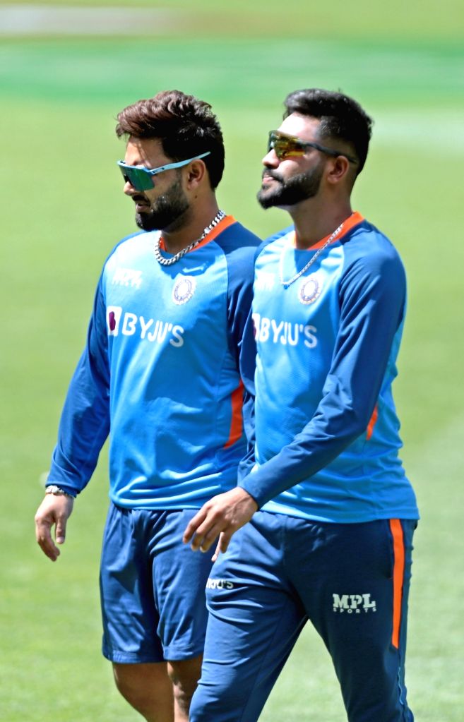 :Adelaide:Indian Cricketer Rishav Pant with Mohammed Siraj during ...