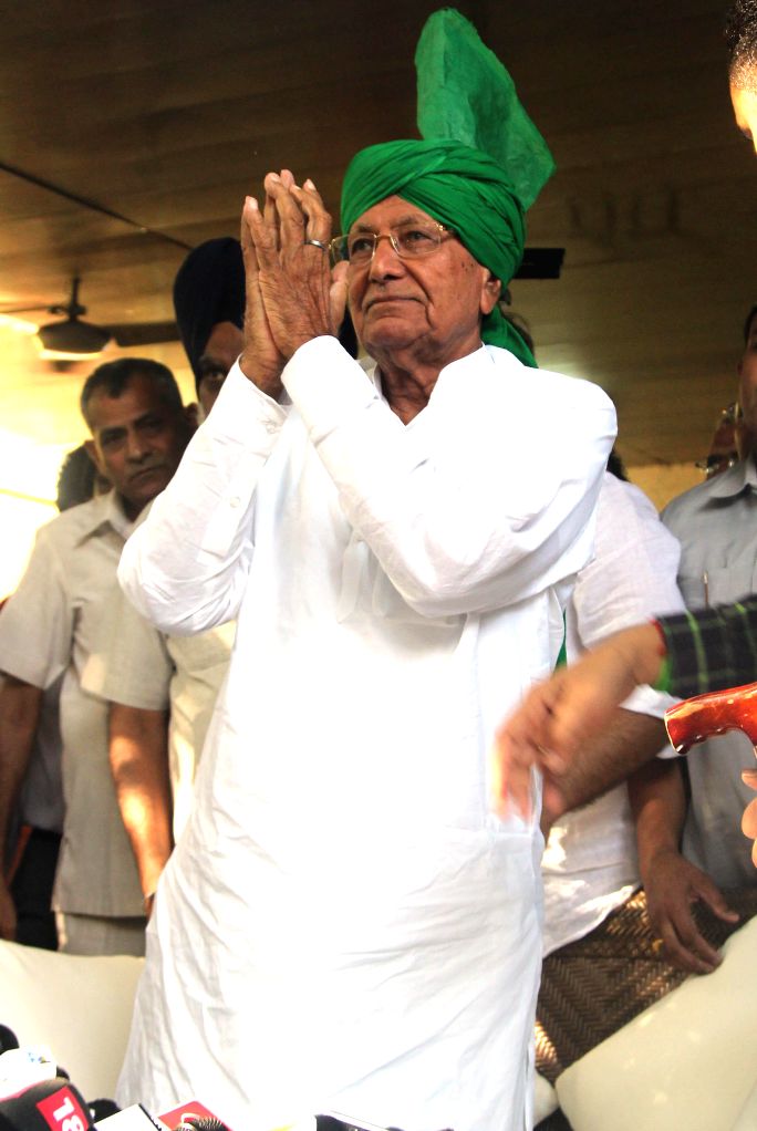 Om Prakash Chautala at a press conference before surrendering